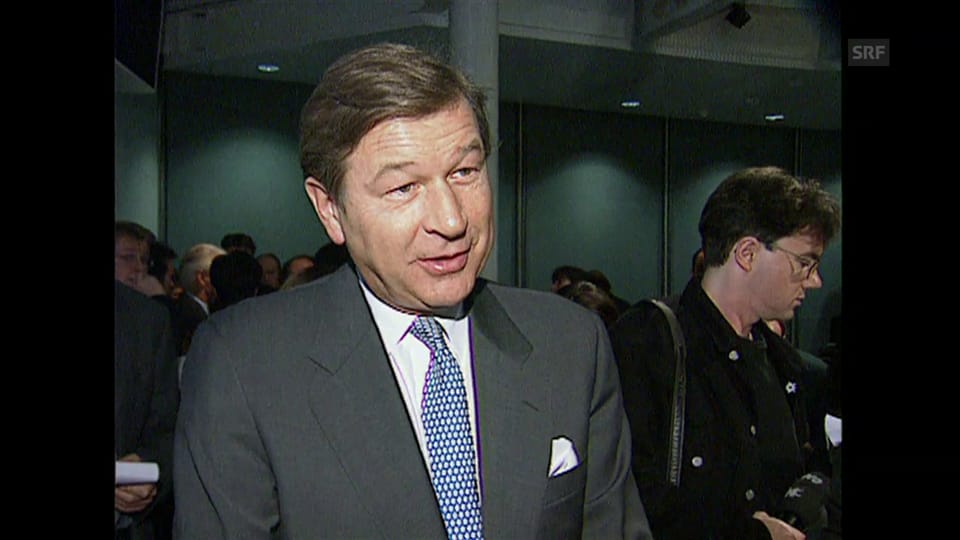 News-Clip - Marcel Ospel erklärt am Tag der Fusion seine Ziele für die ...